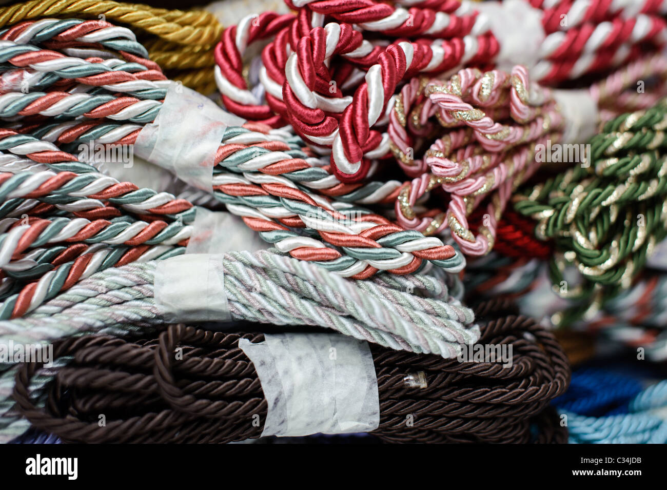 Assorted colorful threads background Stock Photo - Alamy