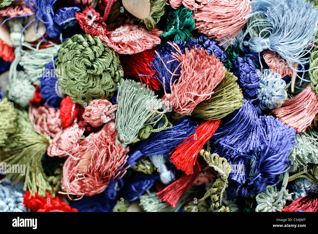 Assorted colorful threads background Stock Photo - Alamy