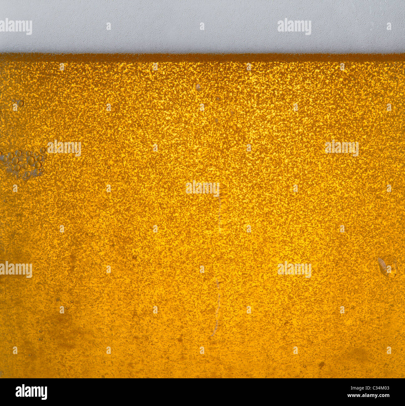 Beer in glass texture Stock Photo - Alamy