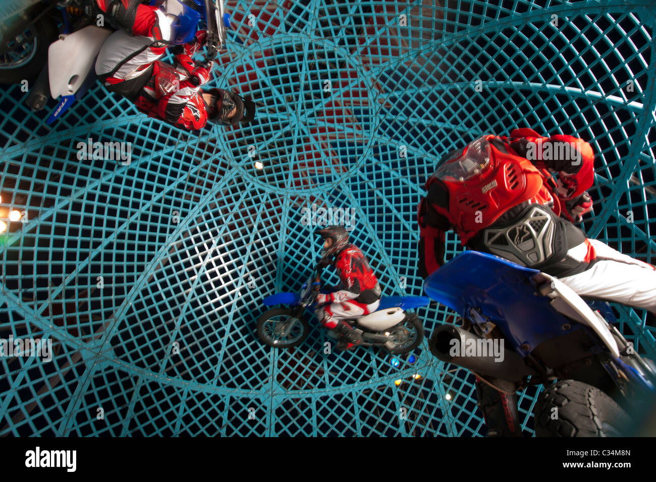 Circus Ball of Death motorcycle stunt team Stock Photo - Alamy