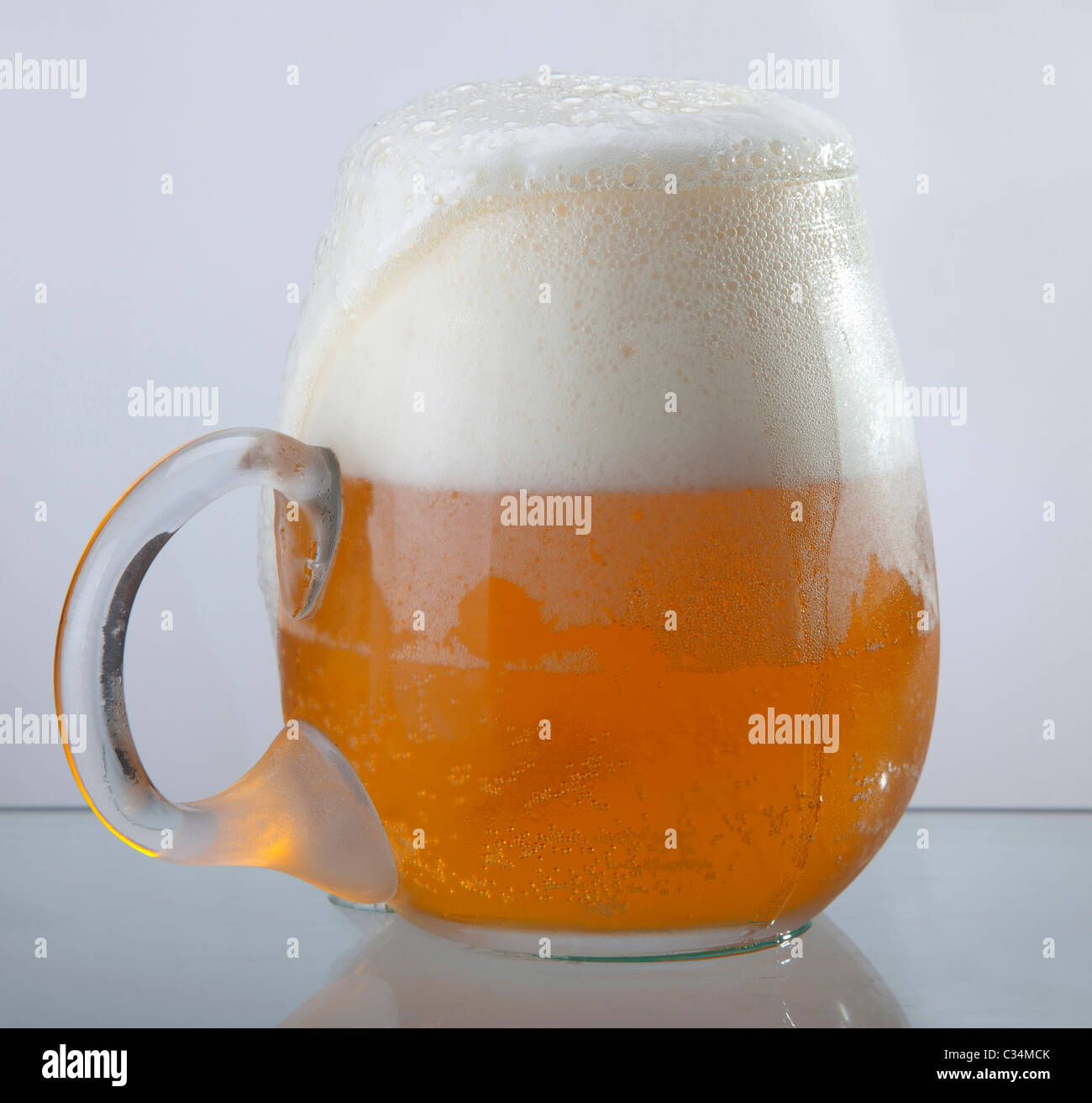 Light beer in glass Stock Photo - Alamy
