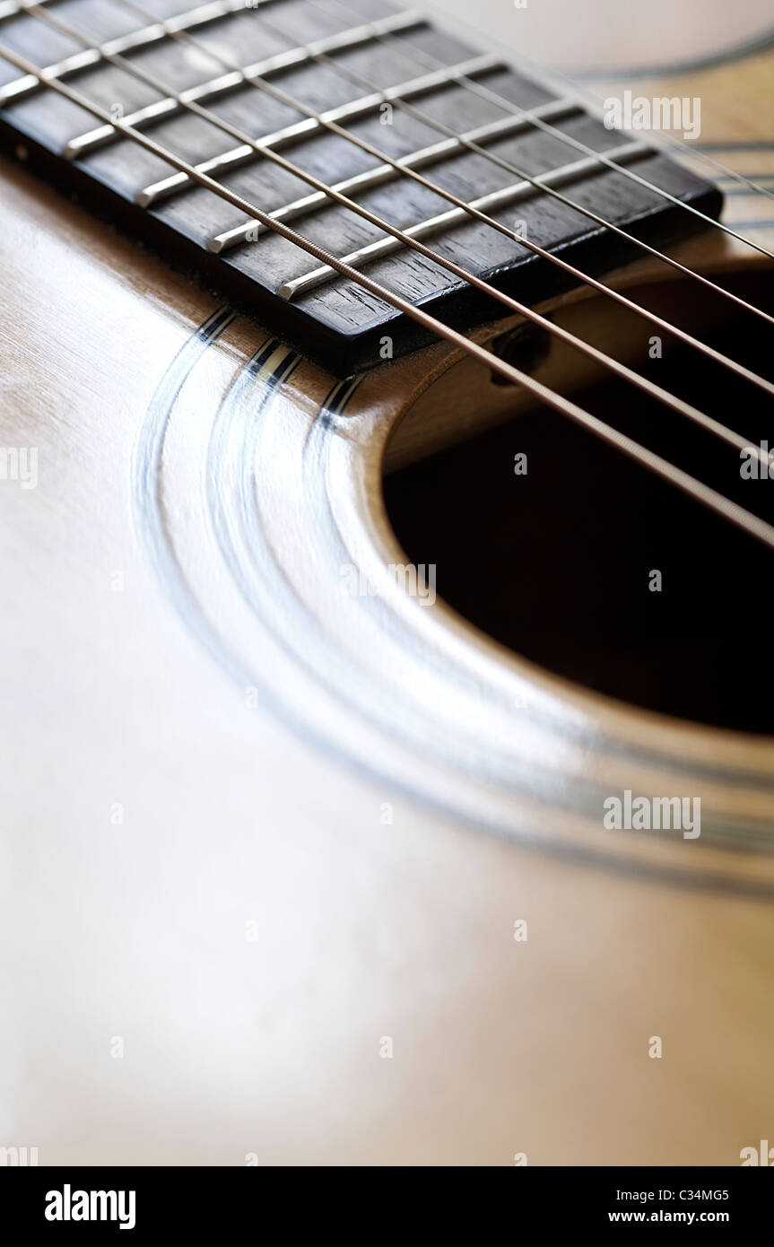 Close up view of a guitar showing the body, strings and neck Stock ...