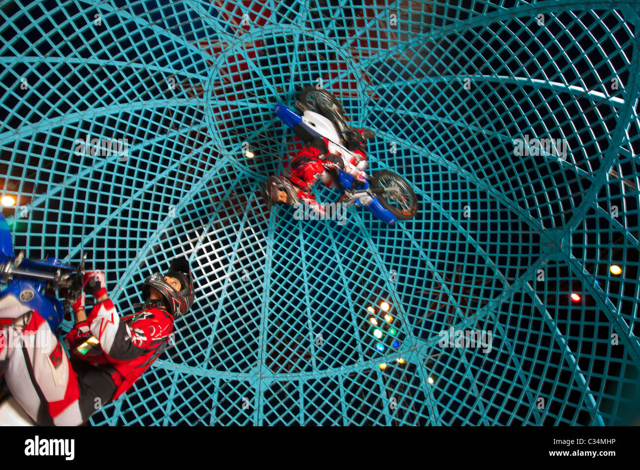 Circus Ball of Death motorcycle stunt team Stock Photo - Alamy