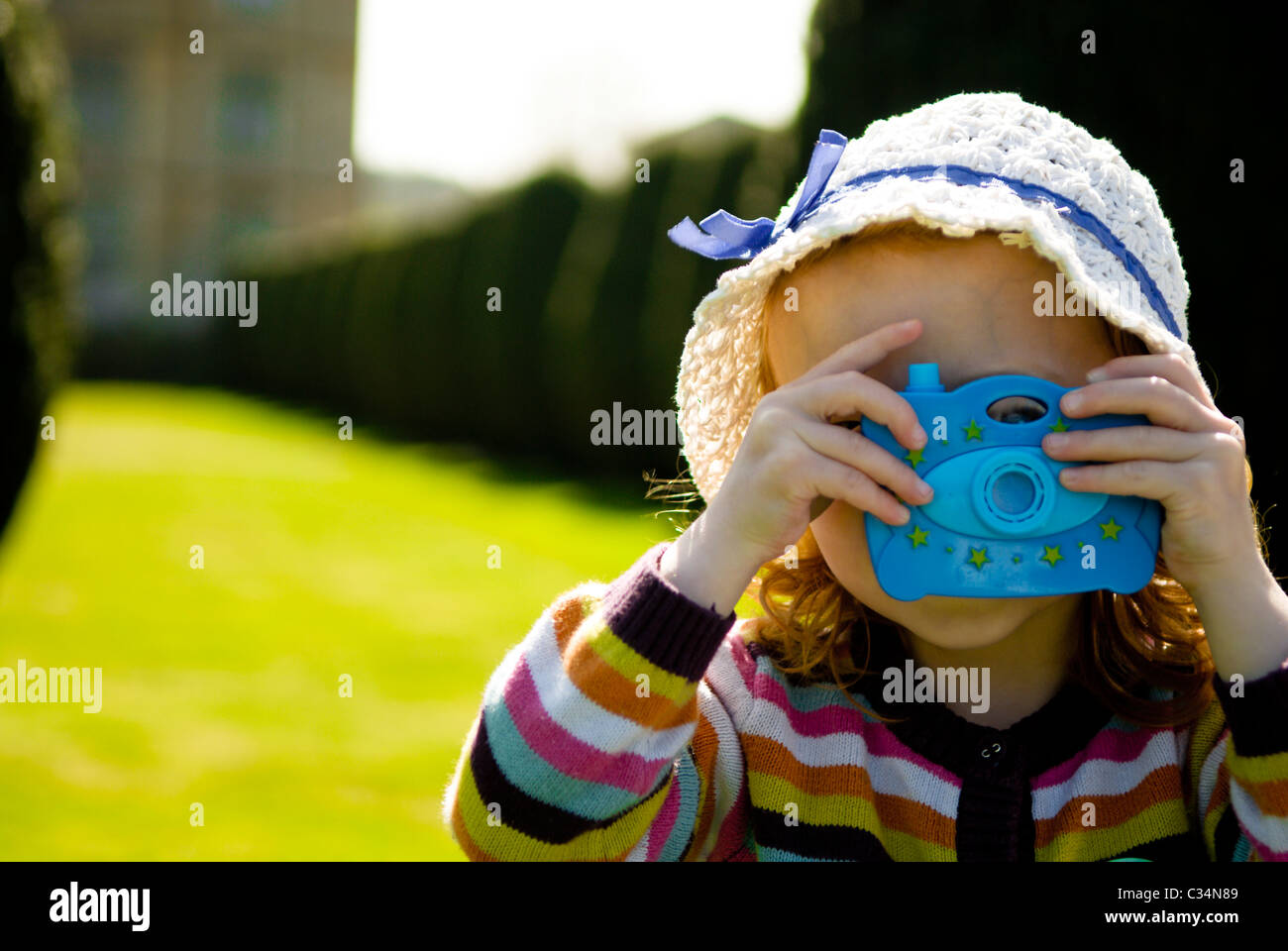 Child pointing toy camera Stock Photo - Alamy