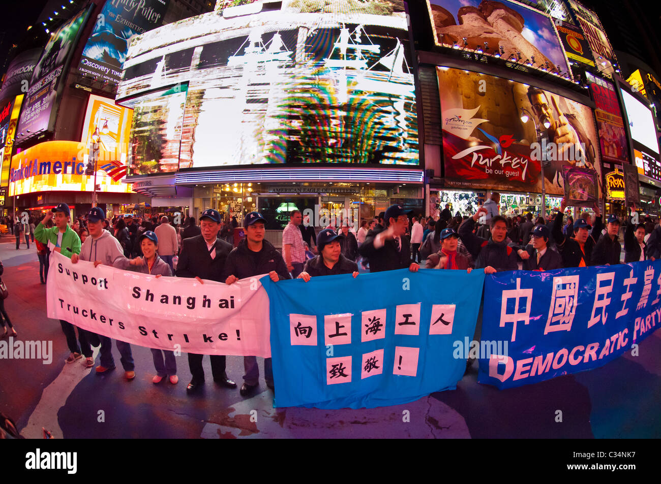 Members of the Chinese community protest in Times Square in New York in ...
