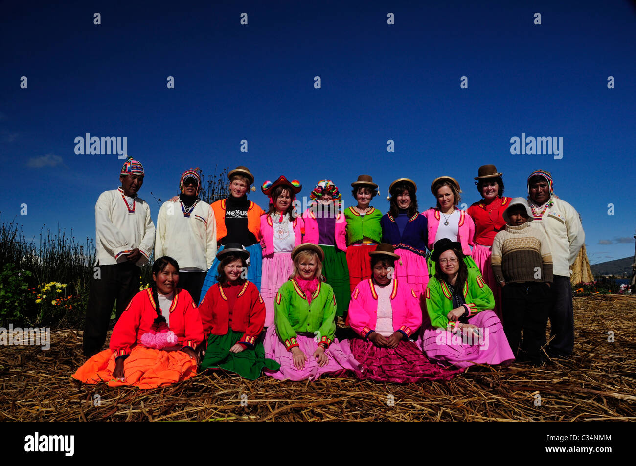 Group og tourist in tradtional peruvian clothes Stock Photo - Alamy