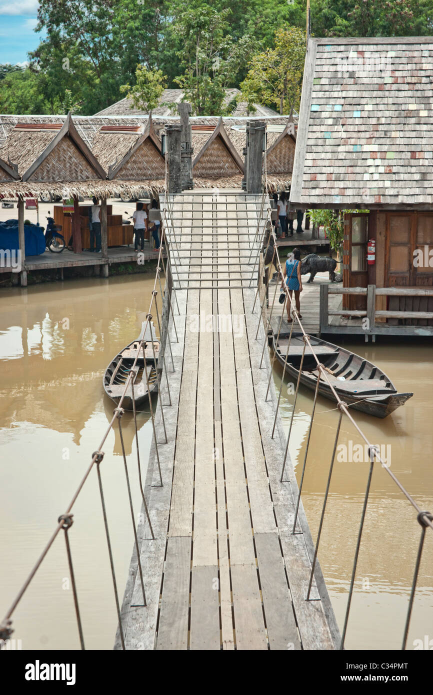 suspension bridge over lake at pattaya floating market thailand Stock ...