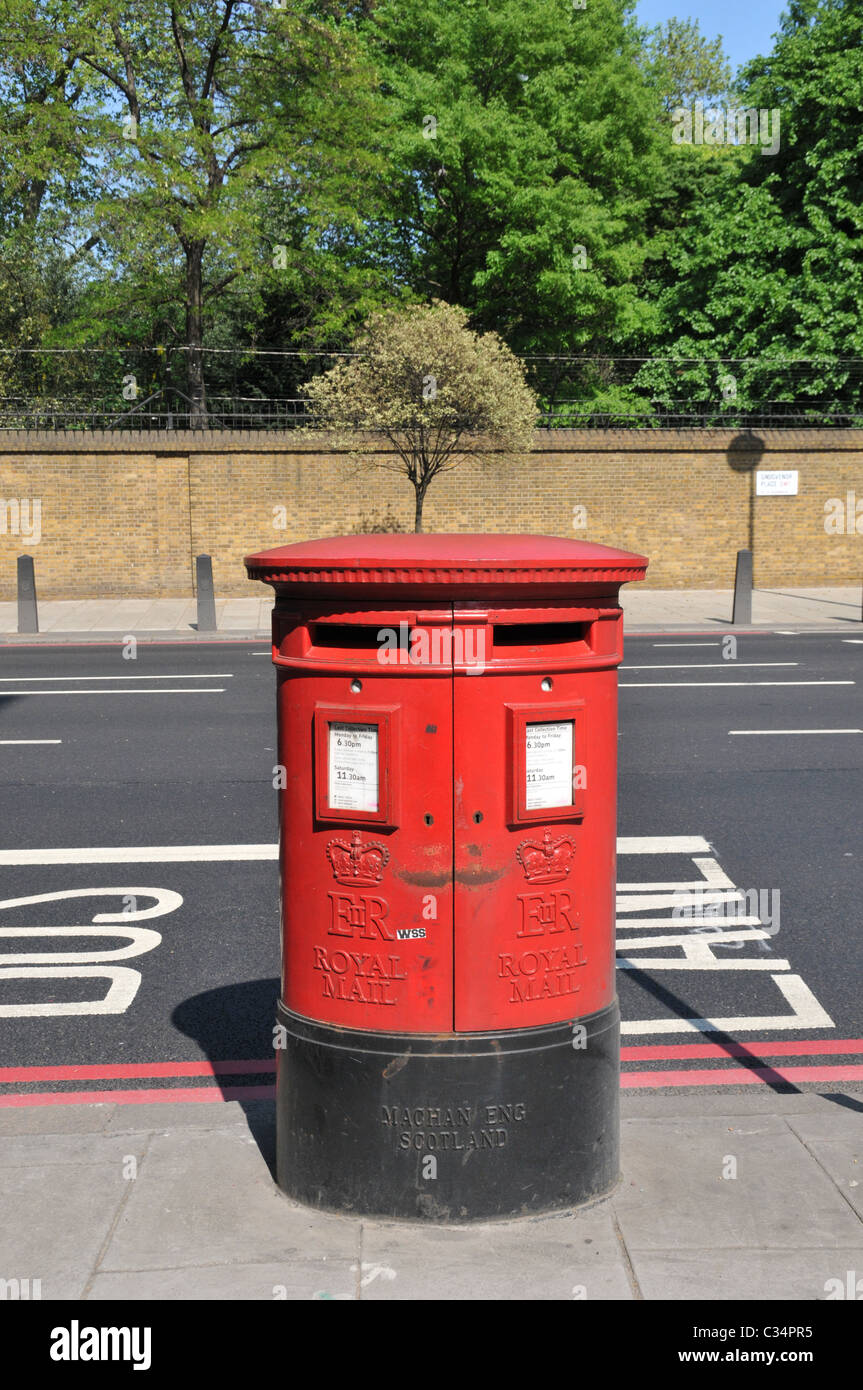 Red Post box England postal stamps Stock Photo - Alamy