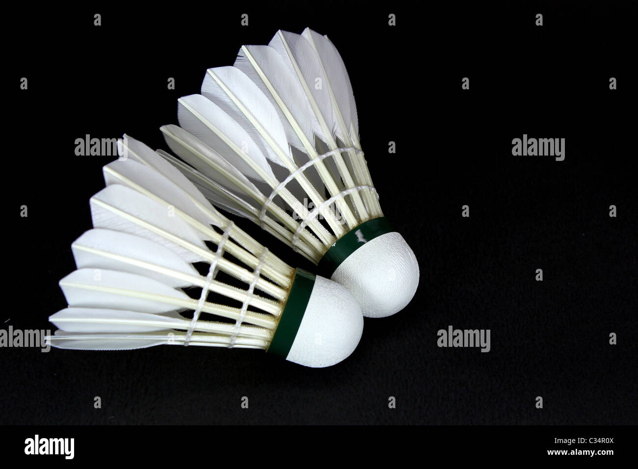 Shuttlecock isolated on black background Stock Photo - Alamy