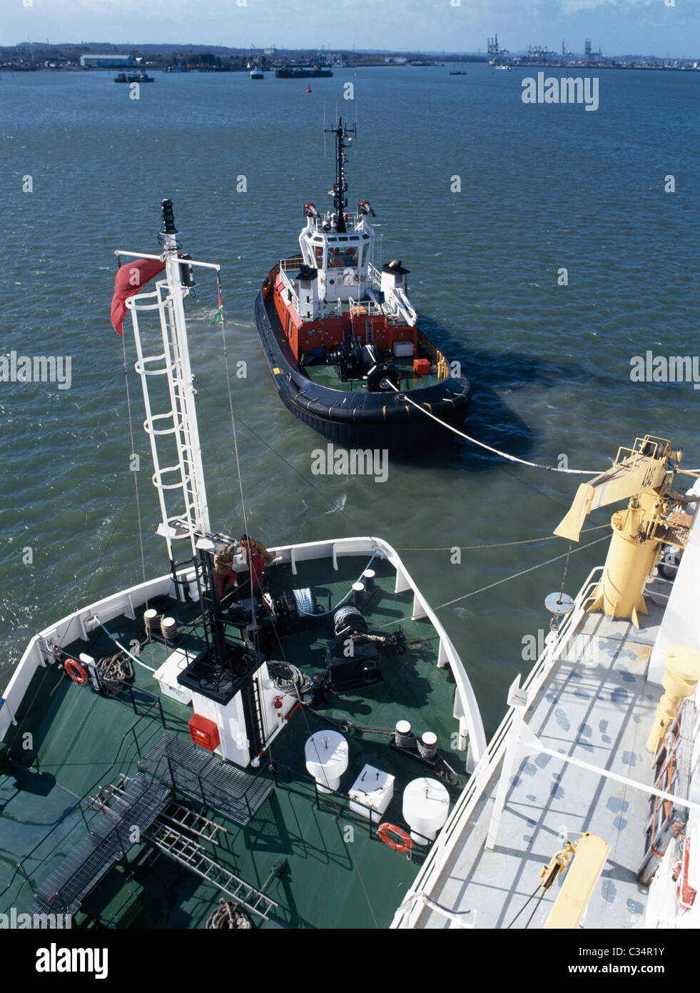 Tug Boat Guiding Ship High Resolution Stock Photography and Images - Alamy