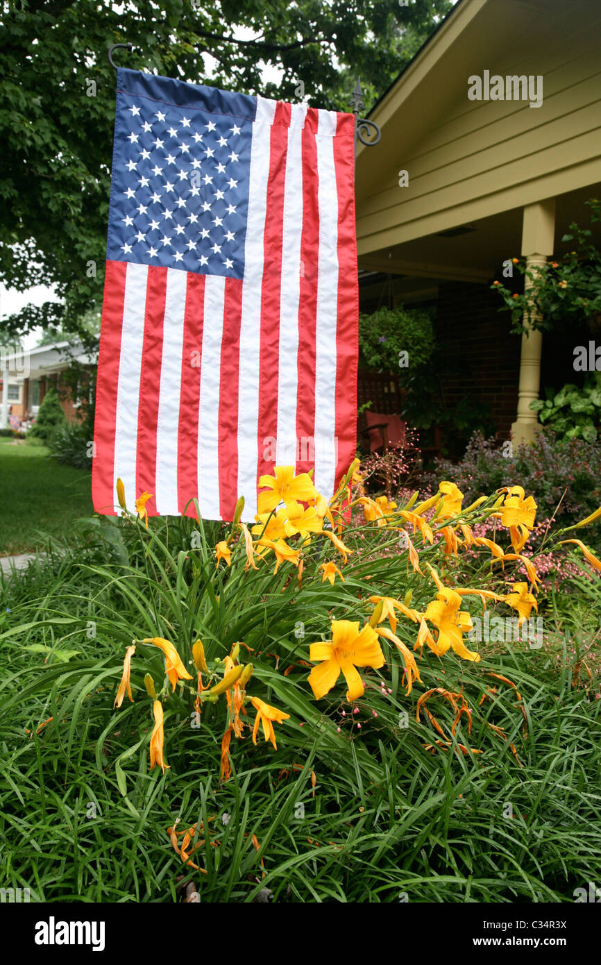 A home with the American flag on display Stock Photo - Alamy