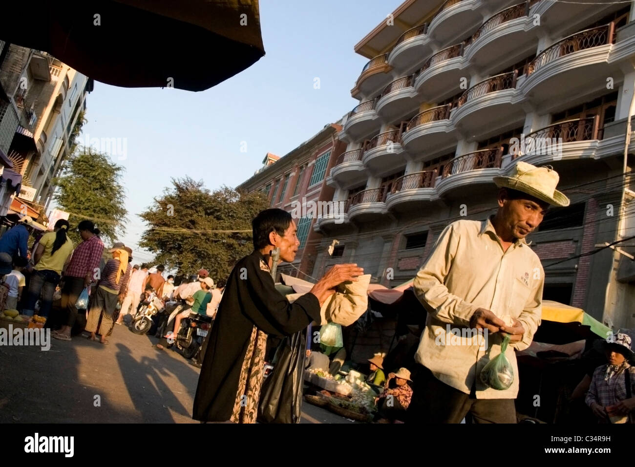 Kneeling man cambodia hi-res stock photography and images - Alamy