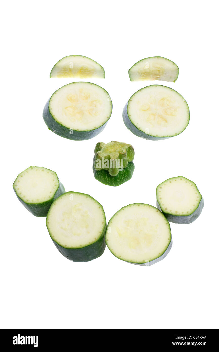 Zucchini Pieces Arranged in Shape of Face Stock Photo - Alamy