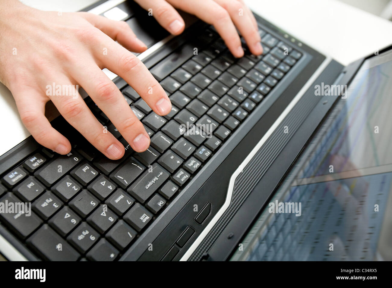 Close-up of male hand over black keyboard of laptop during typing Stock ...