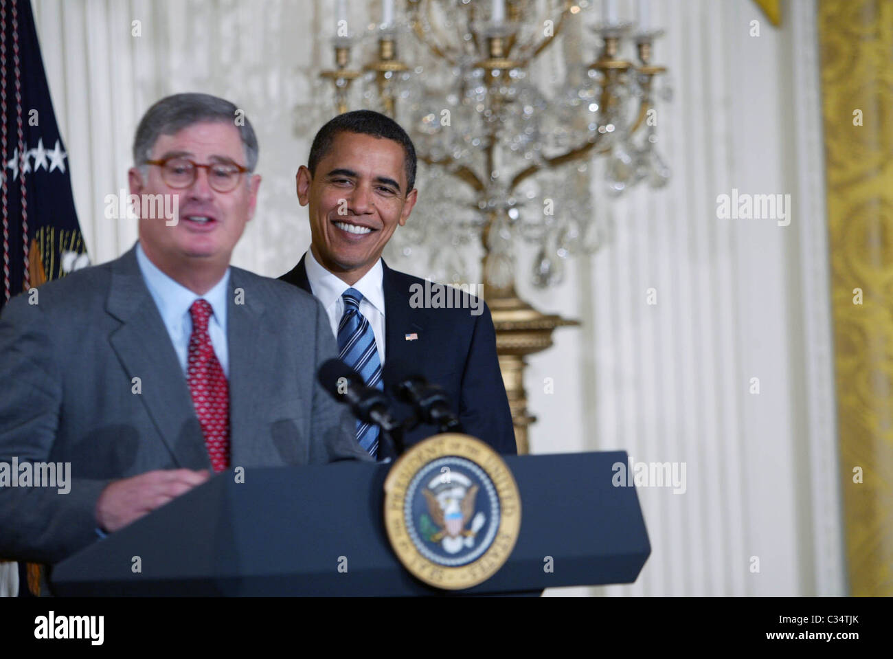 US President Barack Obama (r) listens as Sam Palmisano, Chairman, CEO ...