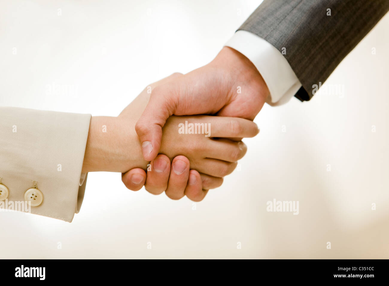 Photo of handshake of business partners after signing contract Stock ...