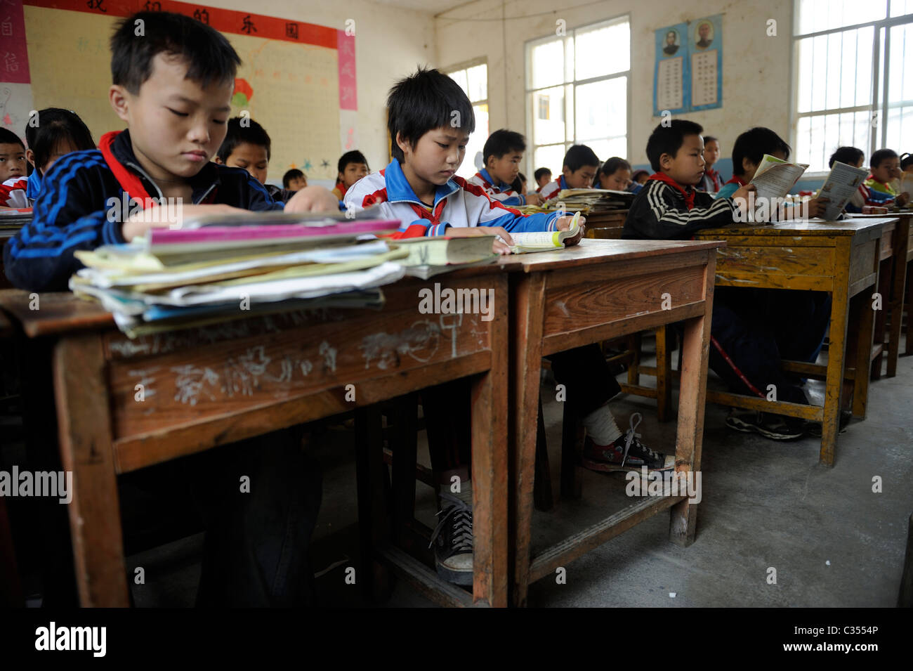 Chinese primary school students attend class in remote countryside in ...