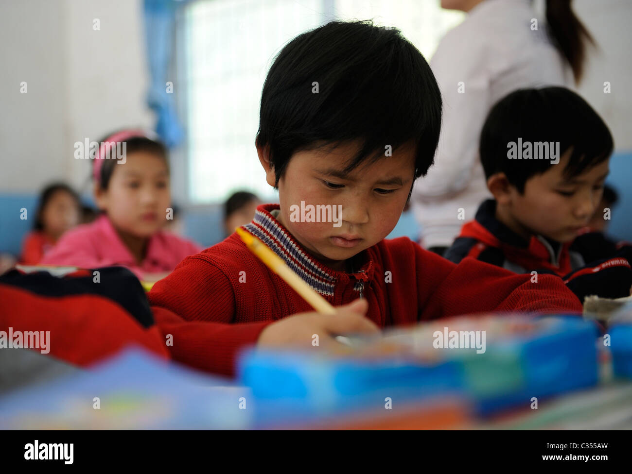 Chinese primary school students attend class in remote countryside in ...