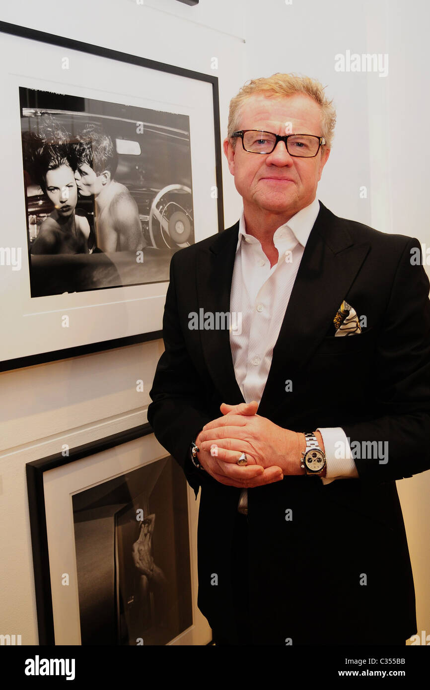 Tony McGee in front of his work at a private viewing of 'Kiss' at The ...