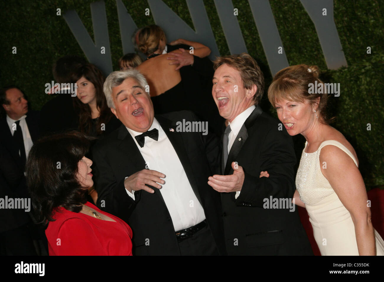 Jay Leno and his wife Mavis Nicholson with Martin Short and his wife ...