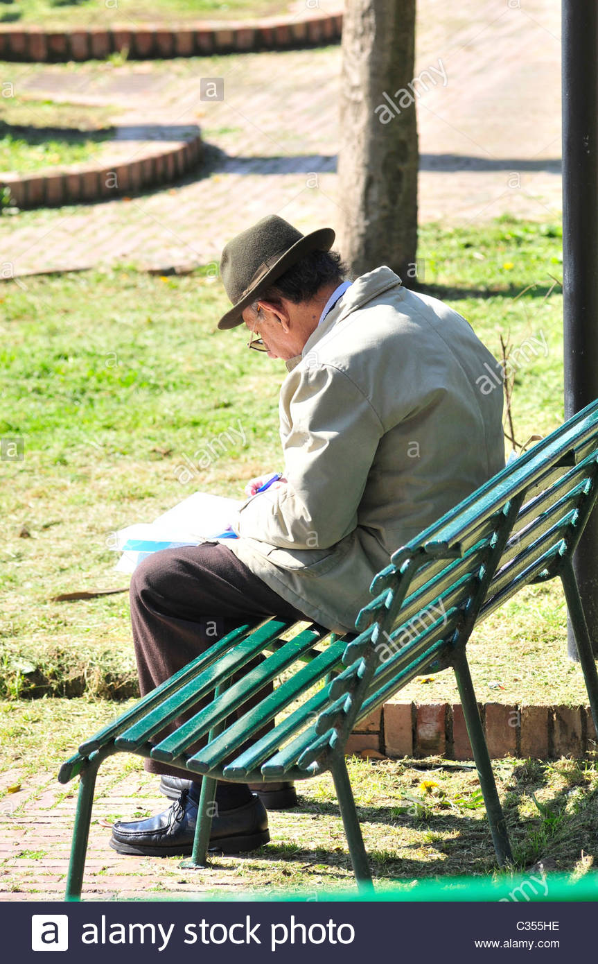 Old Man Sitting On A Bench High Resolution Stock Photography and Images ...