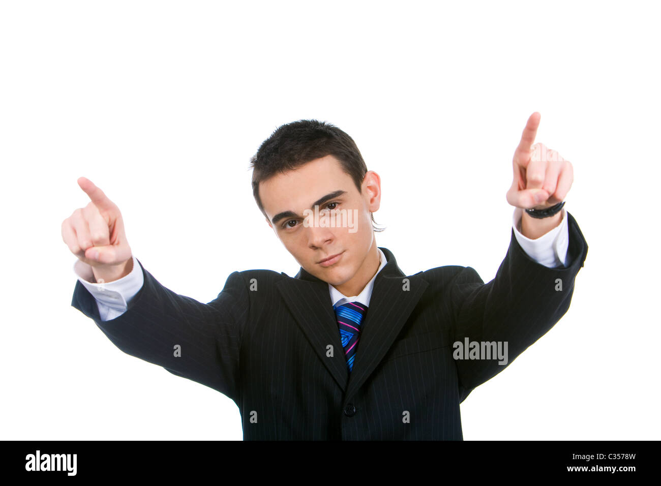 Portrait of successful guy pointing at camera with forefingers ...