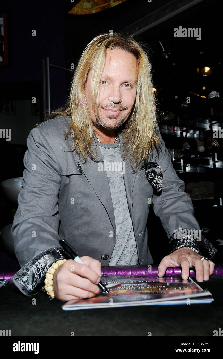 Vince Neil of Motley Crue meets fans and signs autographs at Vince Neil ...