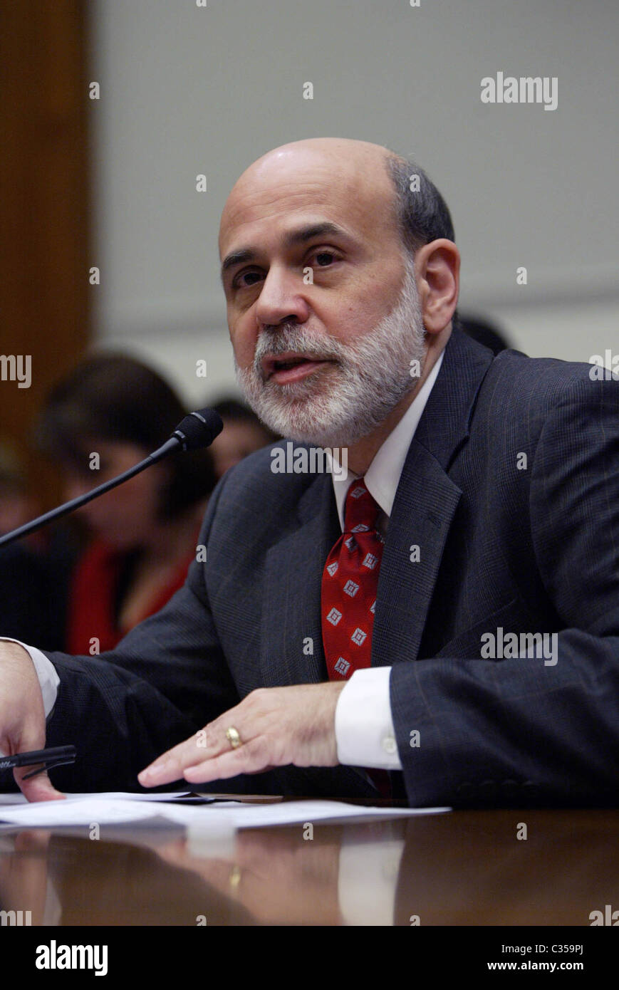 Federal Reserve Board Chairman Ben Bernanke testifies during a hearing ...