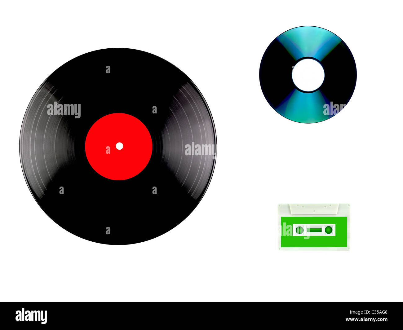 A vinyl records, compact disc and cassette isolated against a white ...