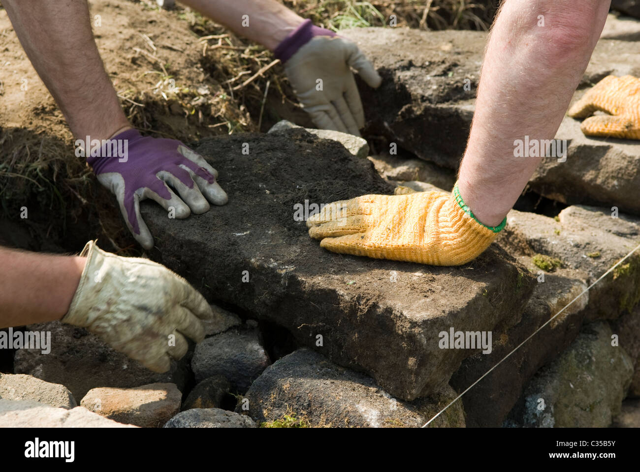 Fixing a drystone wall hi-res stock photography and images - Alamy