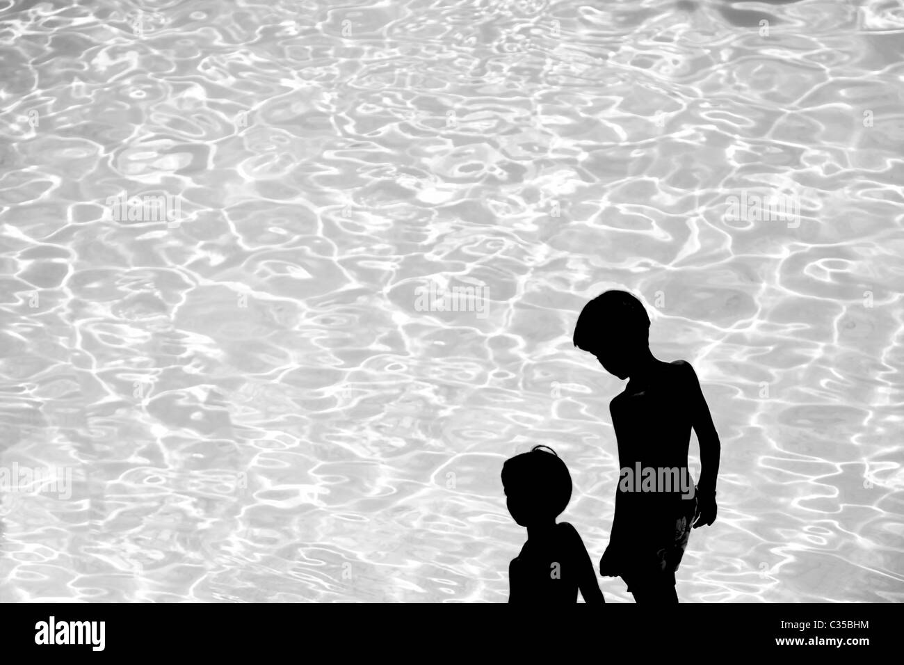 Playing swimming Black and White Stock Photos & Images - Alamy