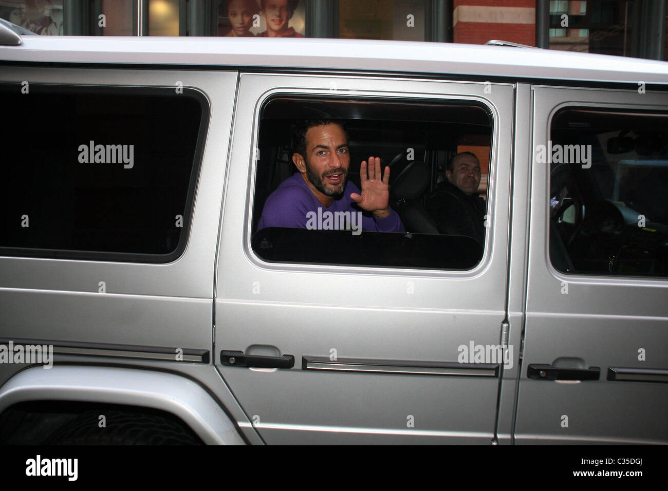 Marc Jacobs poses for photographers outside his hotel in Soho New York ...