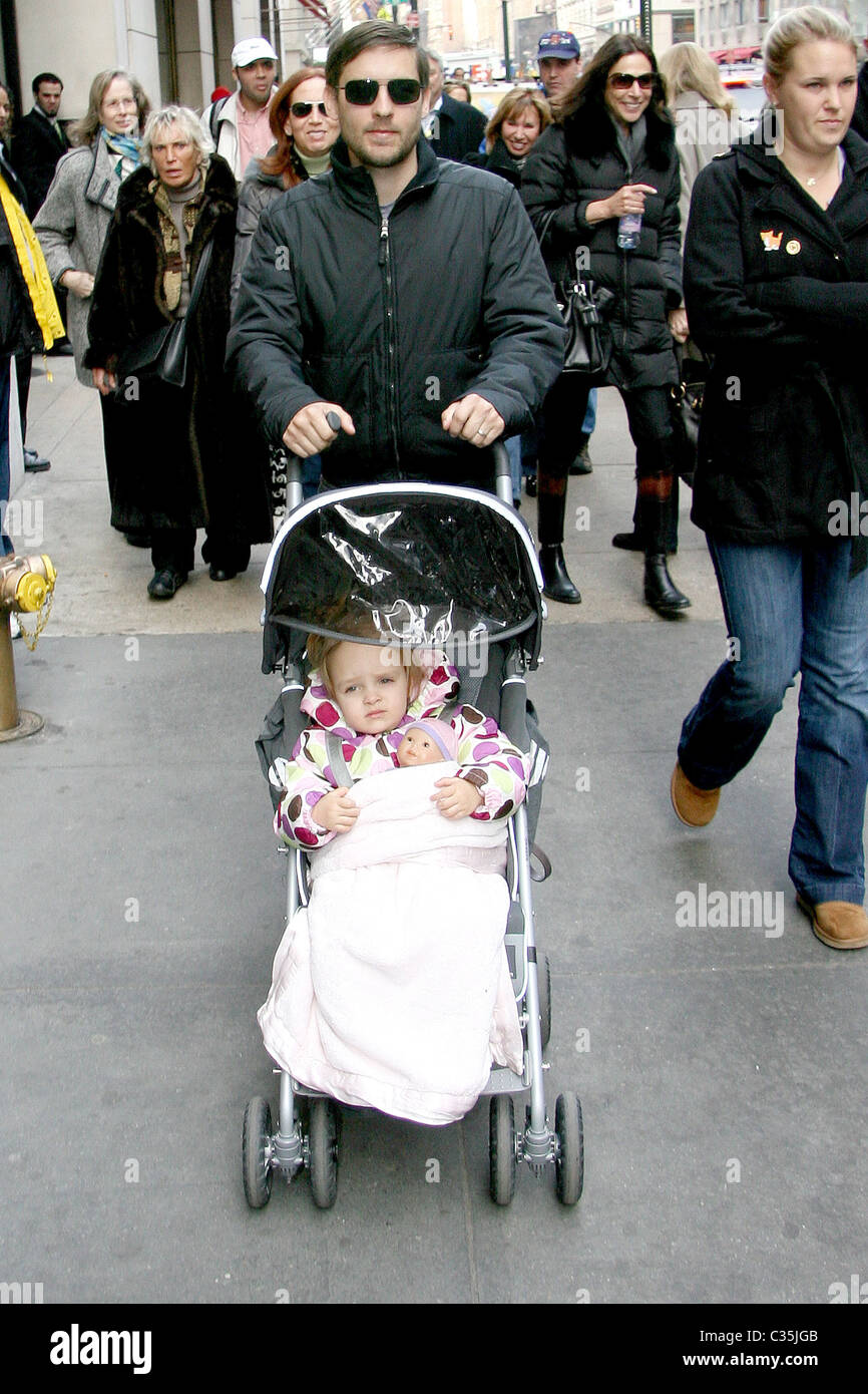 Tobey Maguire pushes a stroller with his daughter Ruby Maguire as they ...