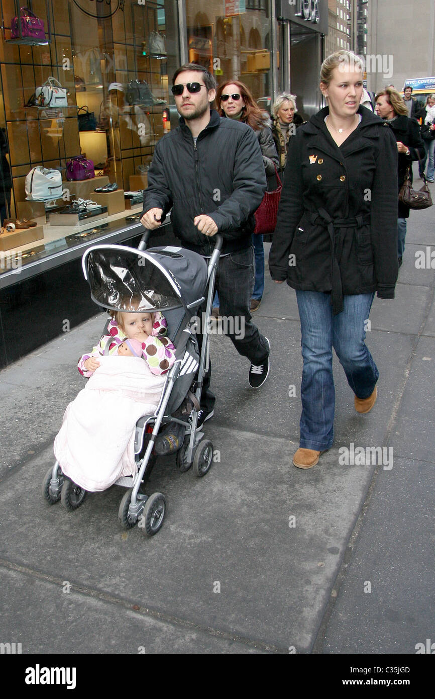 Tobey Maguire pushes a stroller with his daughter Ruby Maguire as they ...