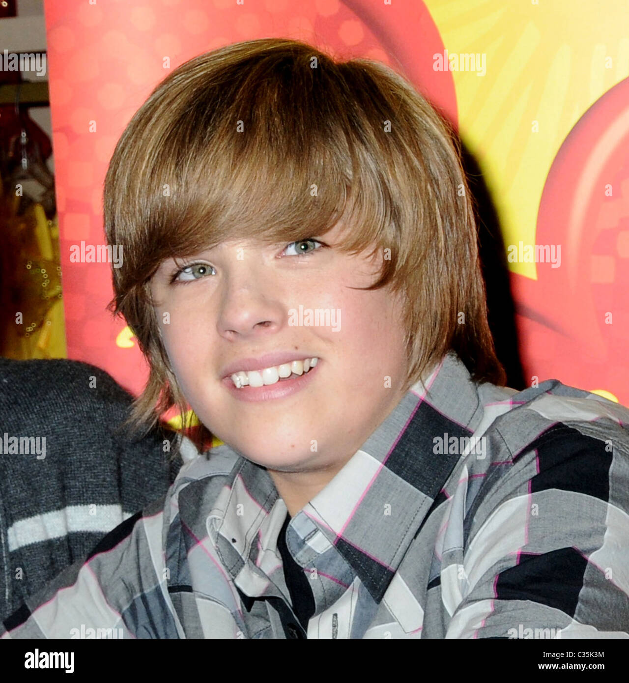 Dylan Sprouse Cast of 'The Suite Life On Deck' visit the Disney store ...