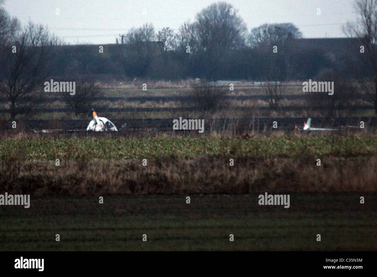 The helicopter crash site in a field next to the M180 motorway at ...