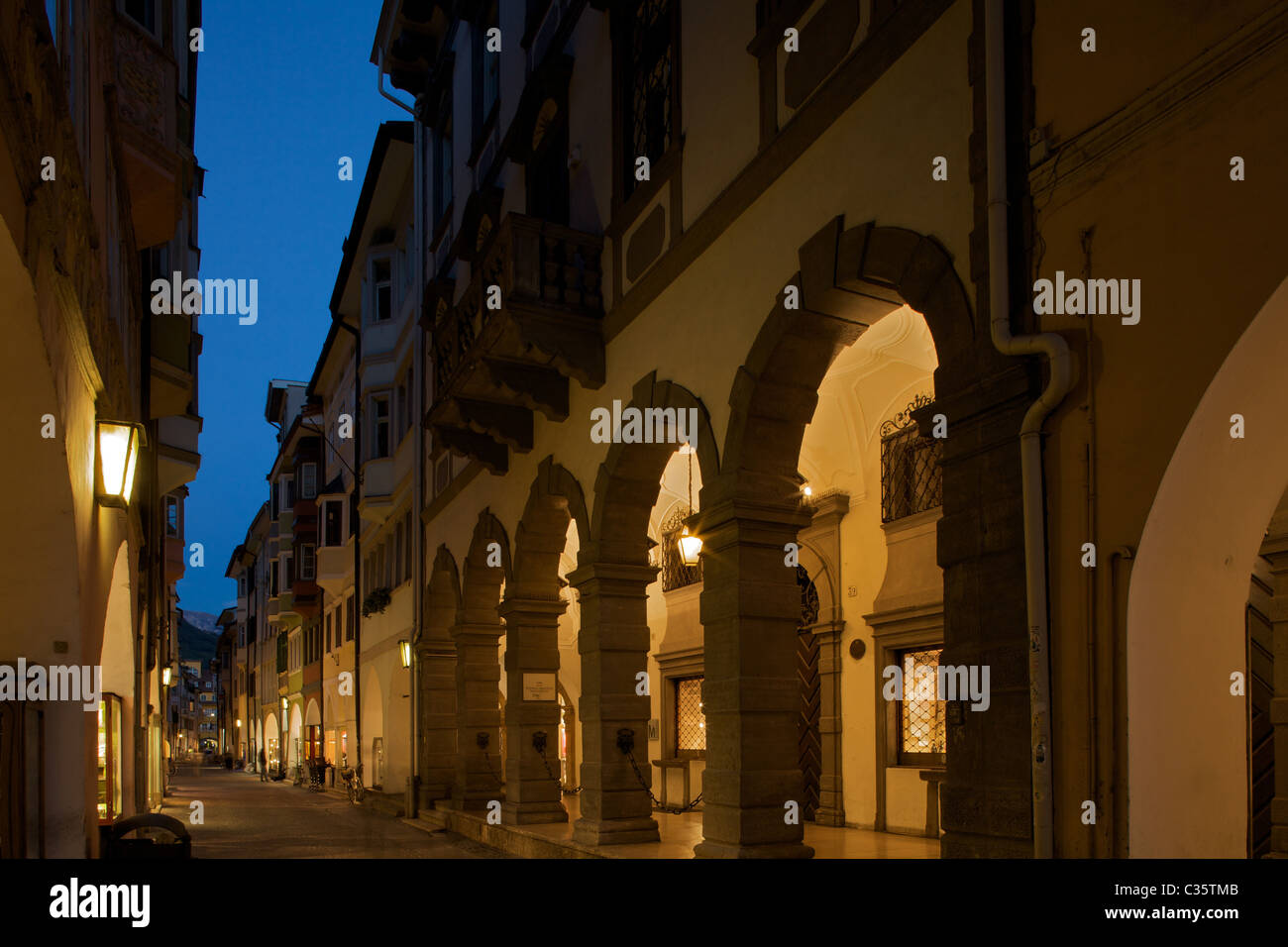 Foreshortening, Portici street at the twilight, Bolzano, Sudtirol, Alto ...