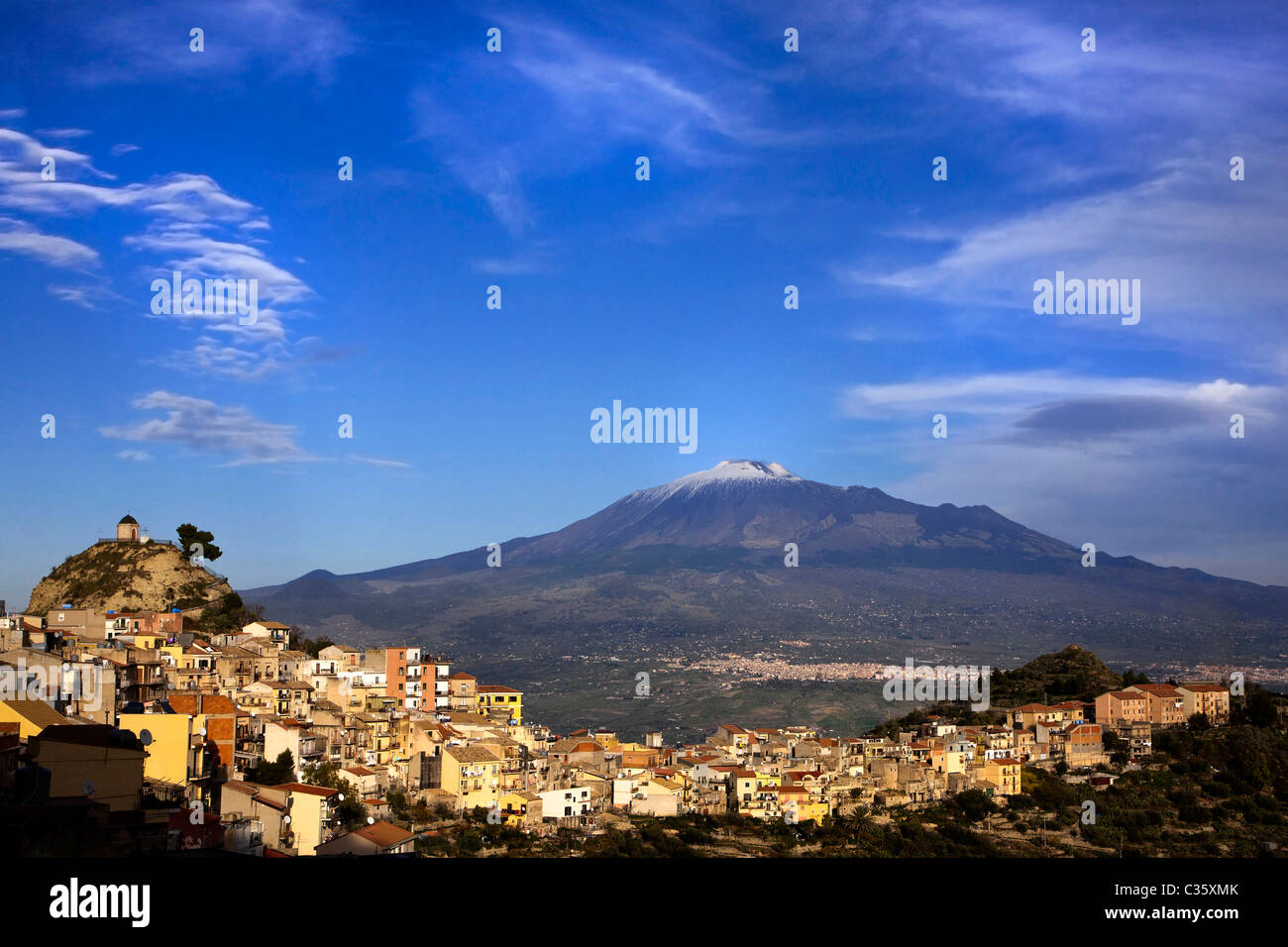 Cityscape of Centuripe, in the background Etna volcano, Centuripe ...