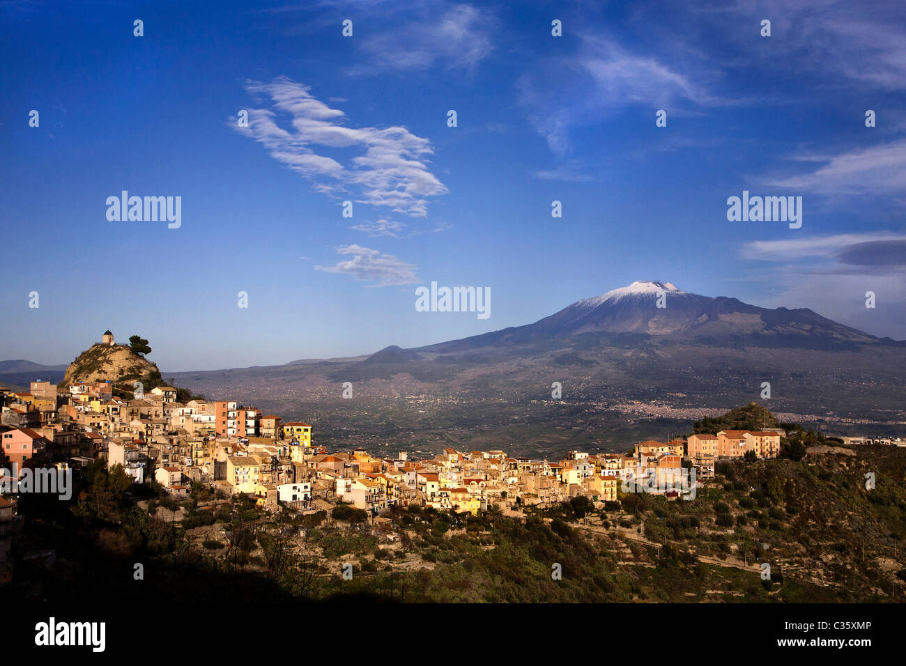 Cityscape of Centuripe, in the background Etna volcano, Centuripe ...