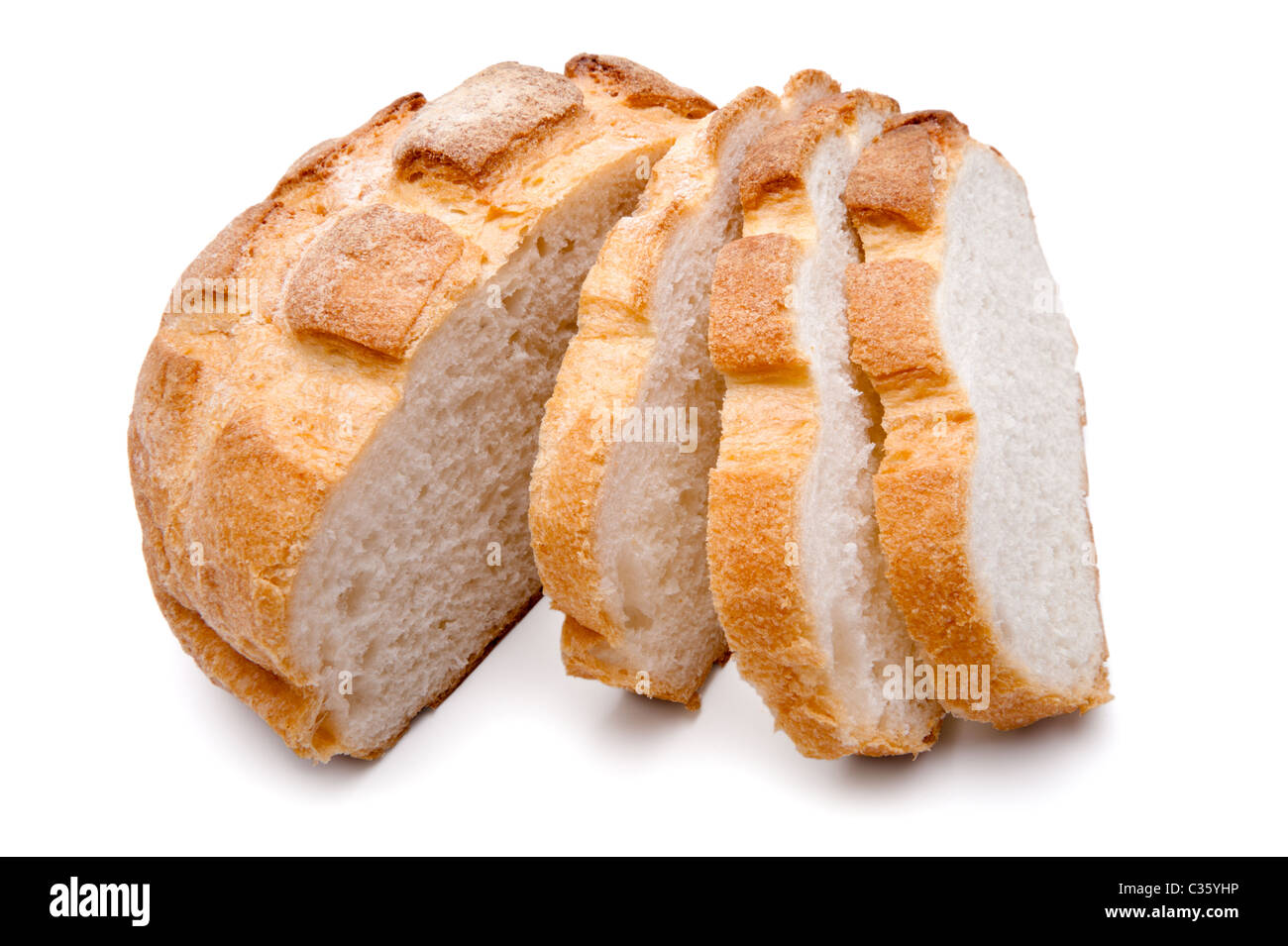 Traditional homemade round bread, sliced, isolated on a white ...