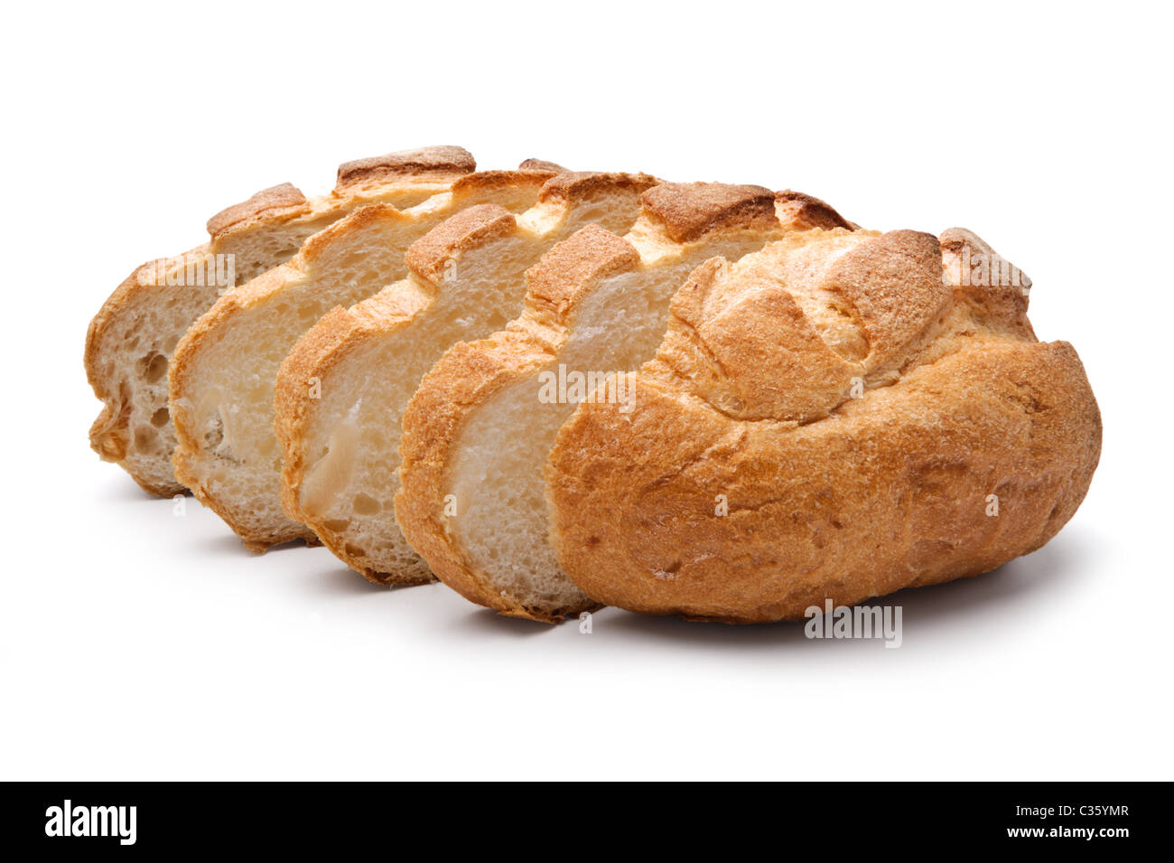 Traditional homemade round bread, sliced, isolated on a white ...