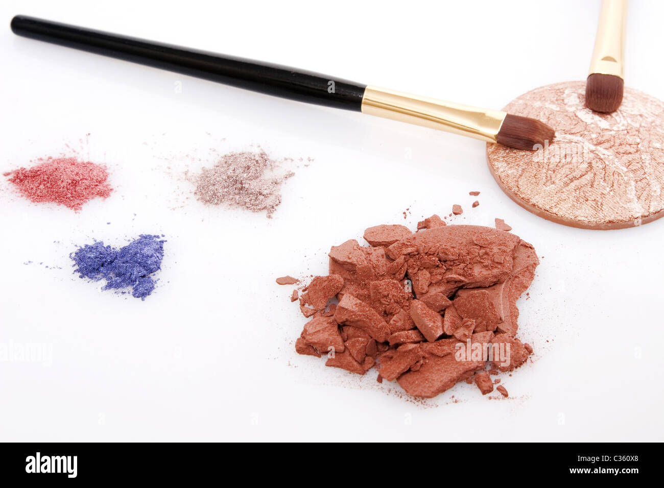 brown,red, blue powder for makeup and two brush Stock Photo - Alamy