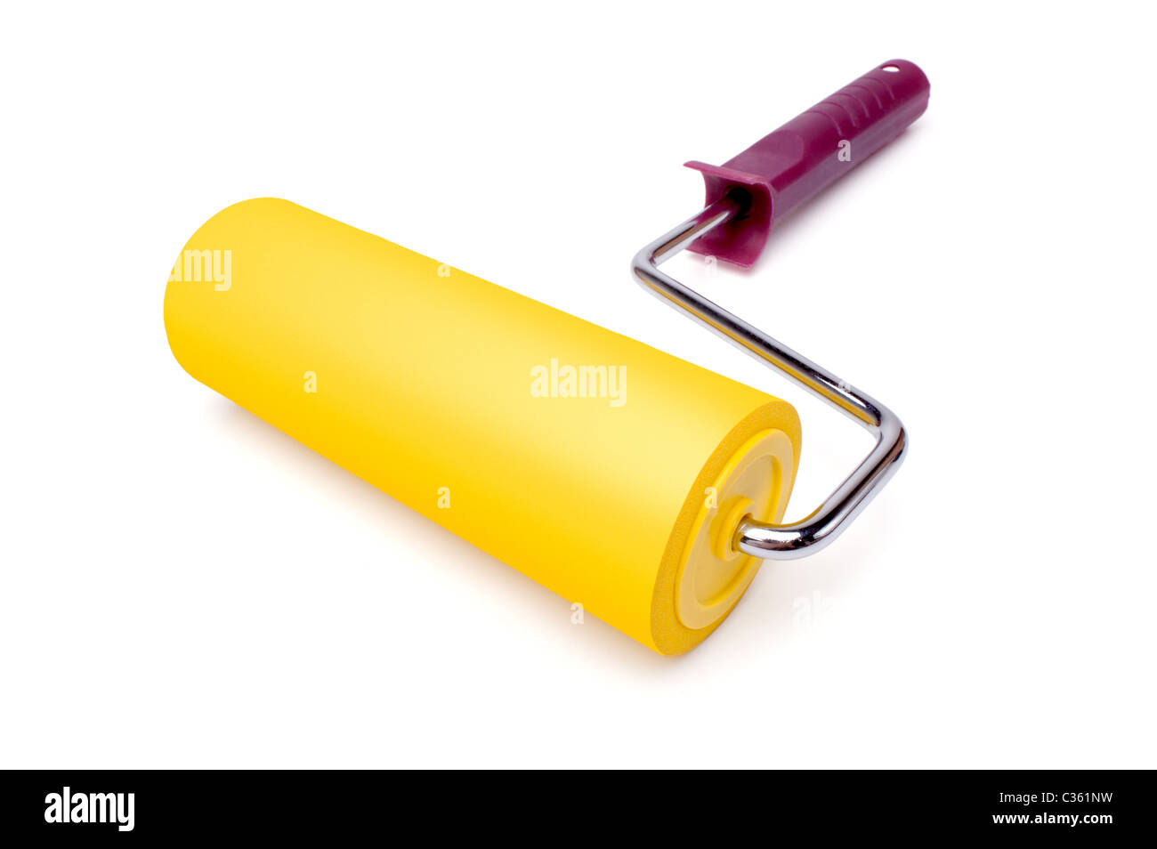 Yellow paint roller, isolated on white background, wide-angle shot ...