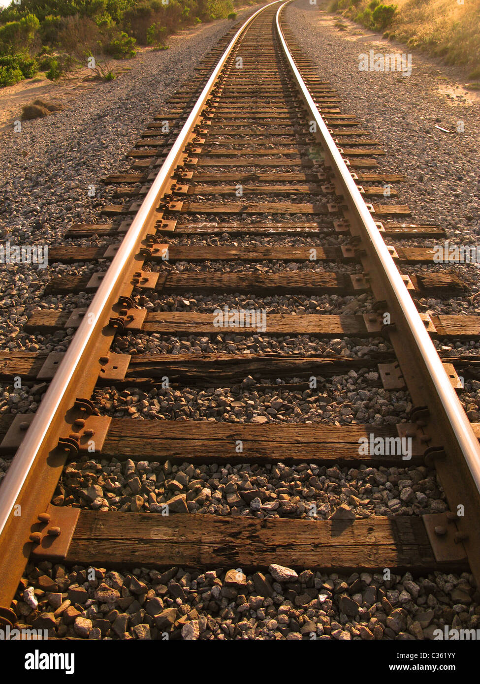 Empty railroad tracks at sunset hi-res stock photography and images - Alamy
