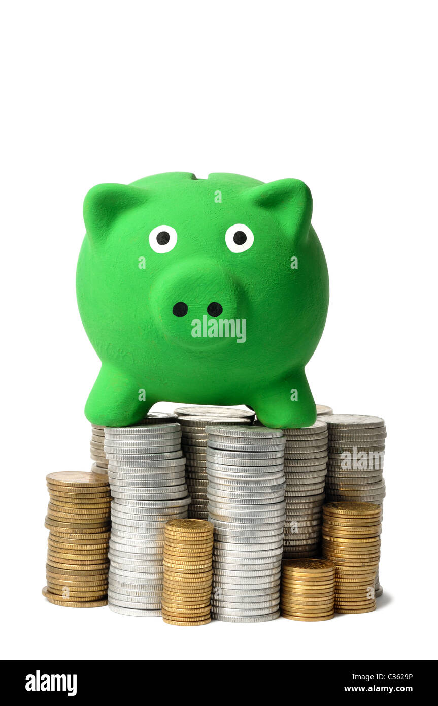 Green Piggy Bank and Coins Stock Photo - Alamy