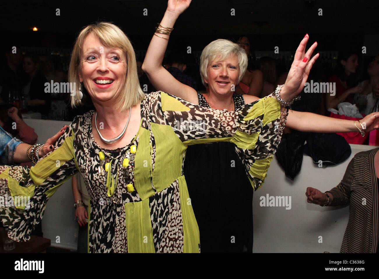 Old women are dancing in a night club in London Stock Photo - Alamy