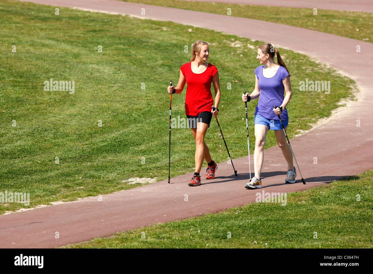 Two female hobby walker, with walking sticks Stock Photo - Alamy