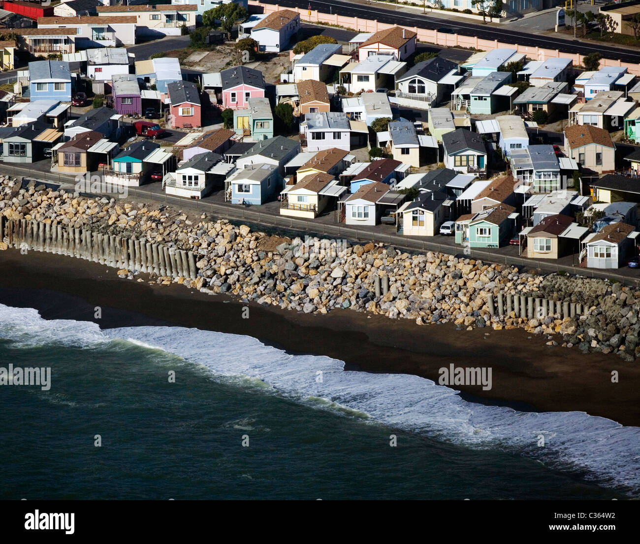 aerial view above prefabricated and mobile Pacific ocean side homes ...