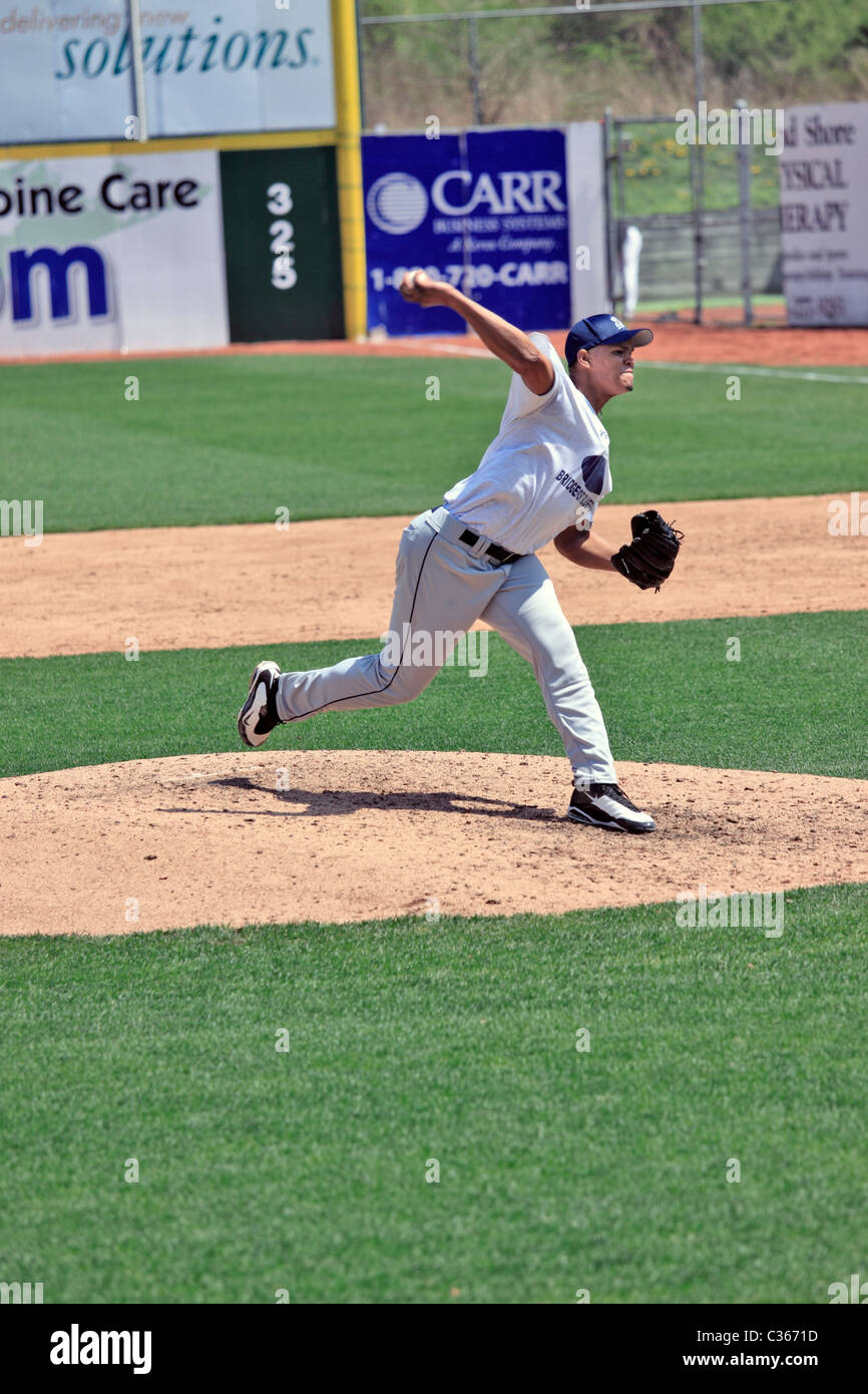 Baseball pitcher throwing ball, Long Island NY Stock Photo - Alamy