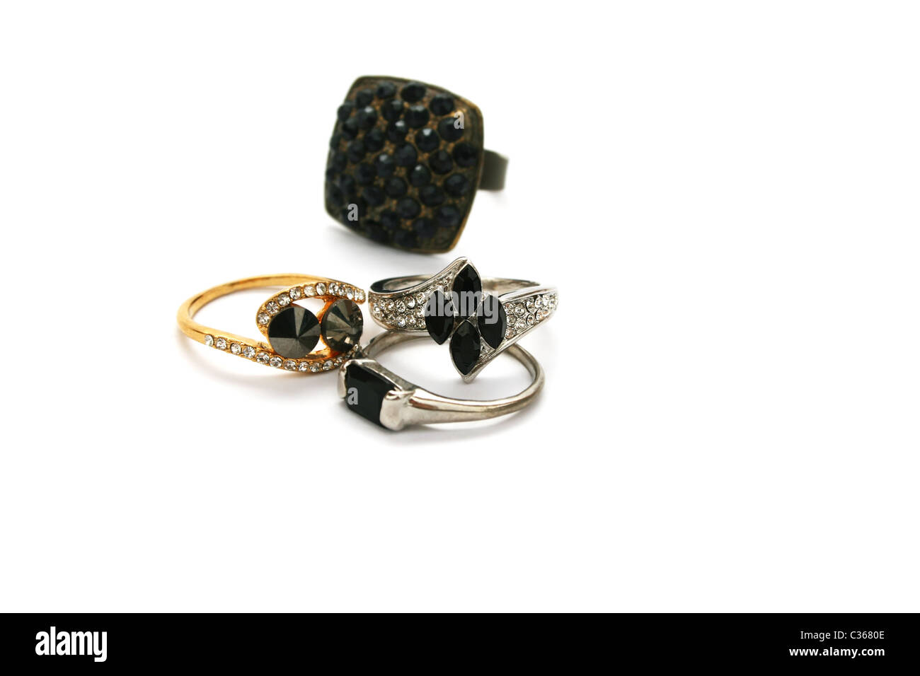 Four rings isolated on white background Stock Photo - Alamy